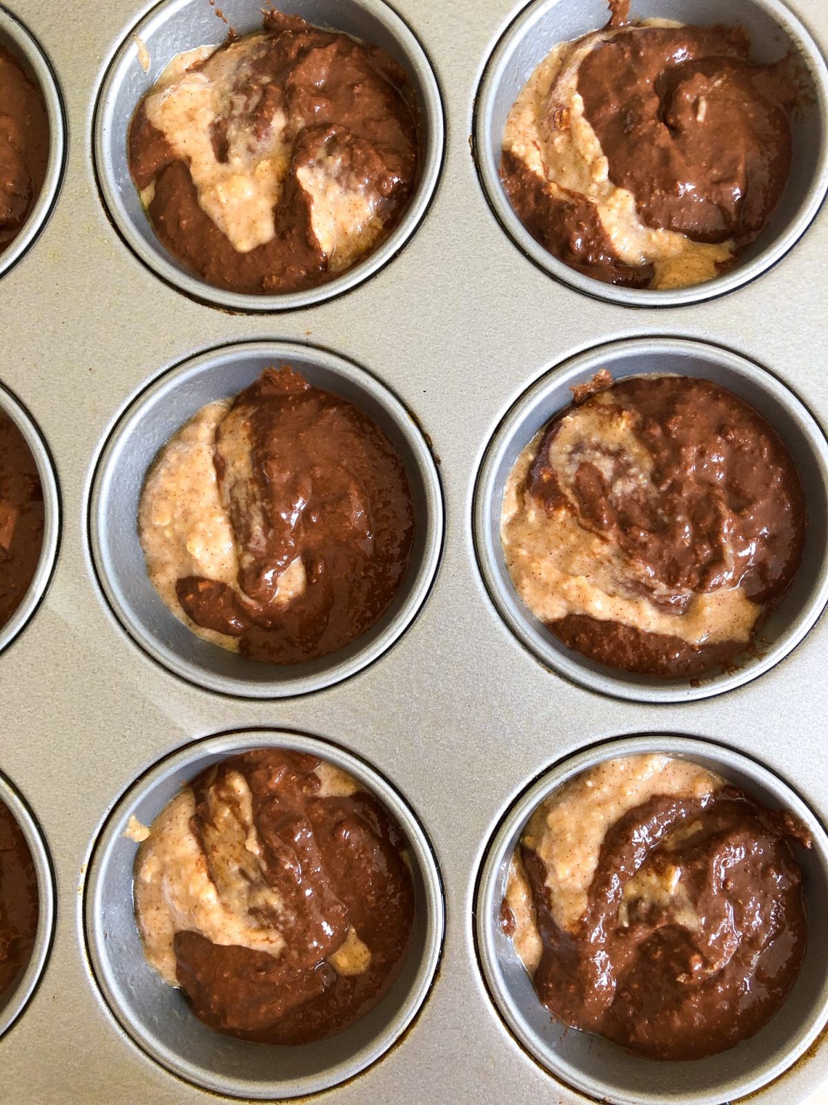 CHOCOLATE SWIRL BANANA MUFFINS - brunettecollective.com